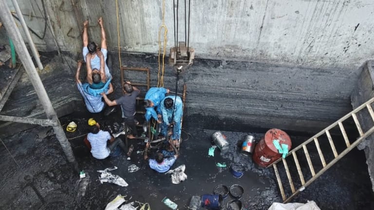 Four workers hospitalised after inhaling toxic gas in factory tank near ...