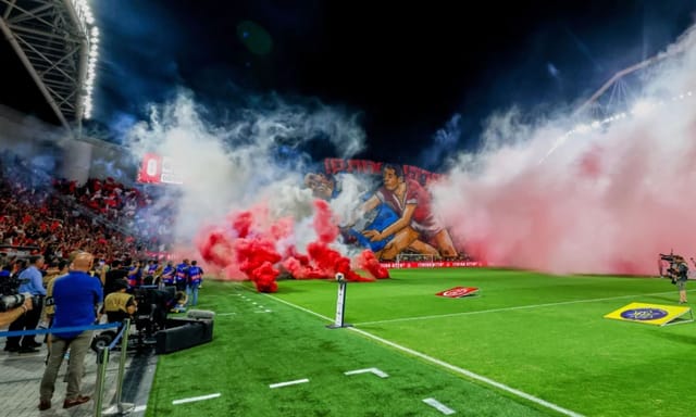 Israeli soccer game abandoned after rioting rival fans throw flares and ...