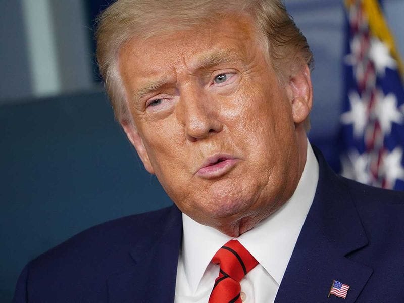 Trump says 'holding off on attack on Iran tomorrow'