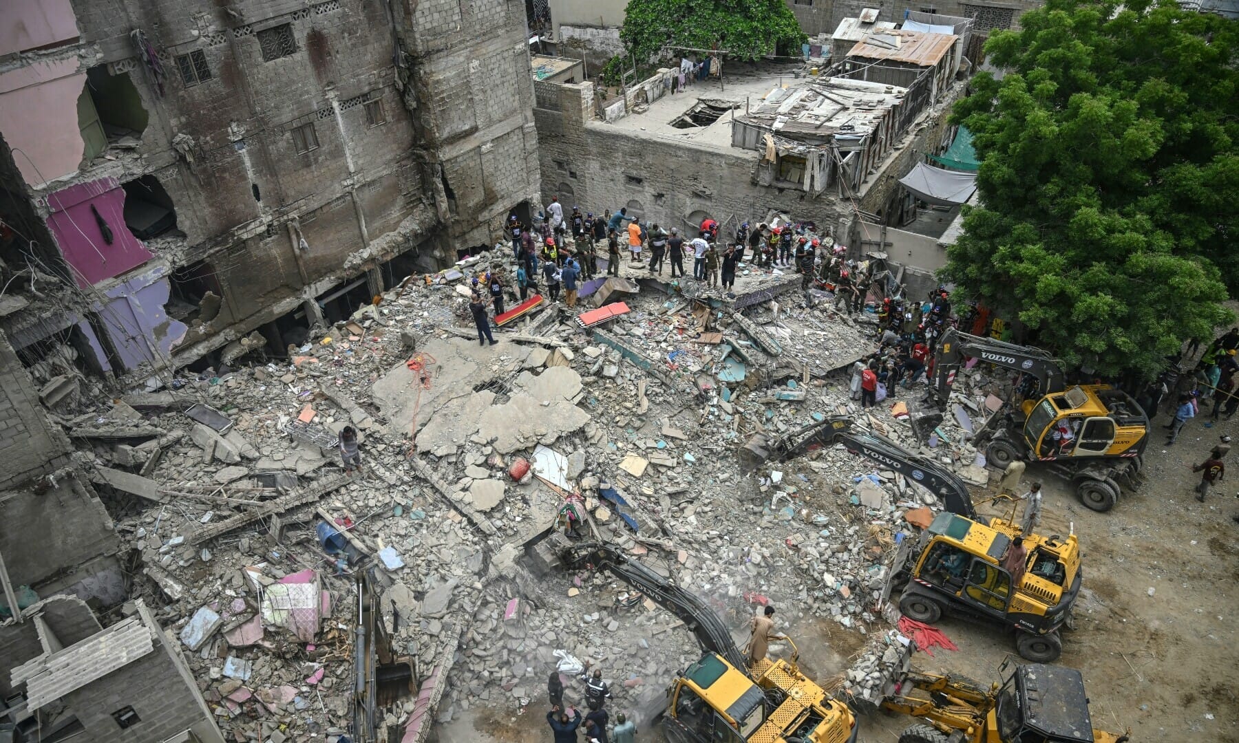 Pakistan: 23 dead in building collapse as Karachi’s unsafe housing ...