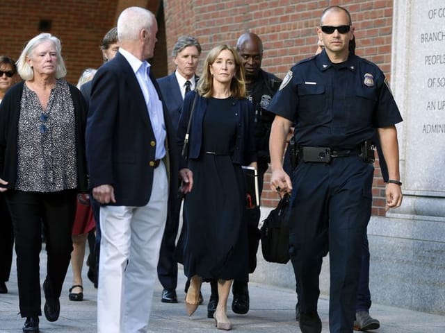 Felicity Huffman starts serving prison time in college scam